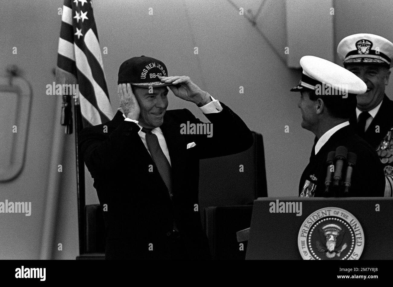CAPT William M. Fogarty, commanding officer, presents President Ronald ...