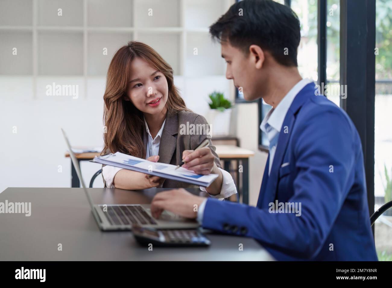 Business team of financial analyze about company's graph profit ...