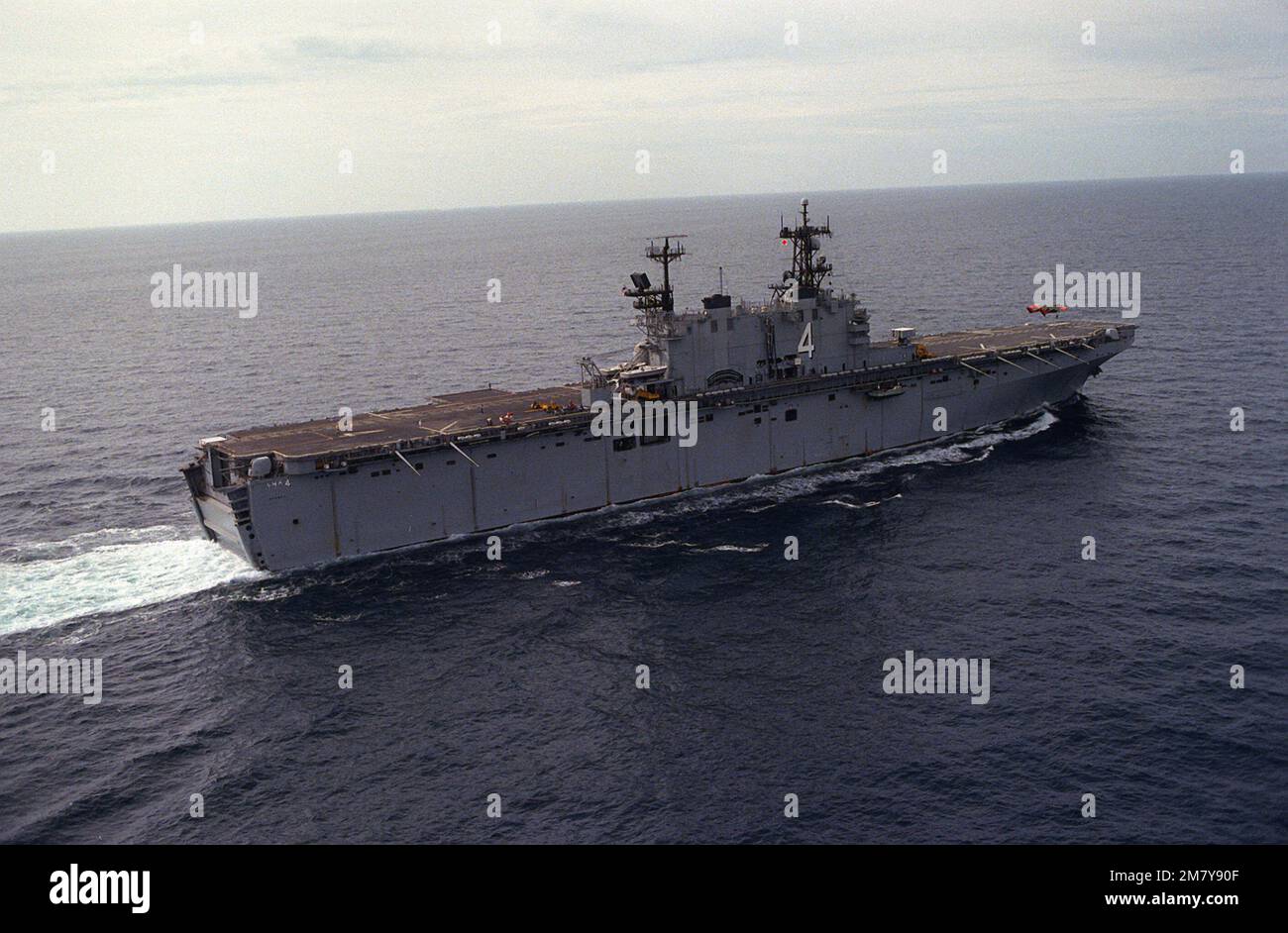 An aerial starboard quarter view of the amphibious assault ship USS ...