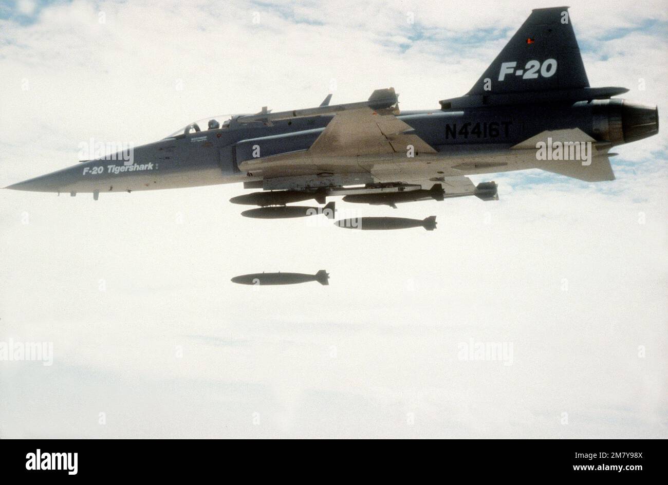 An air-to-air left side view of a Northrop F-20 Tigershark aircraft ...