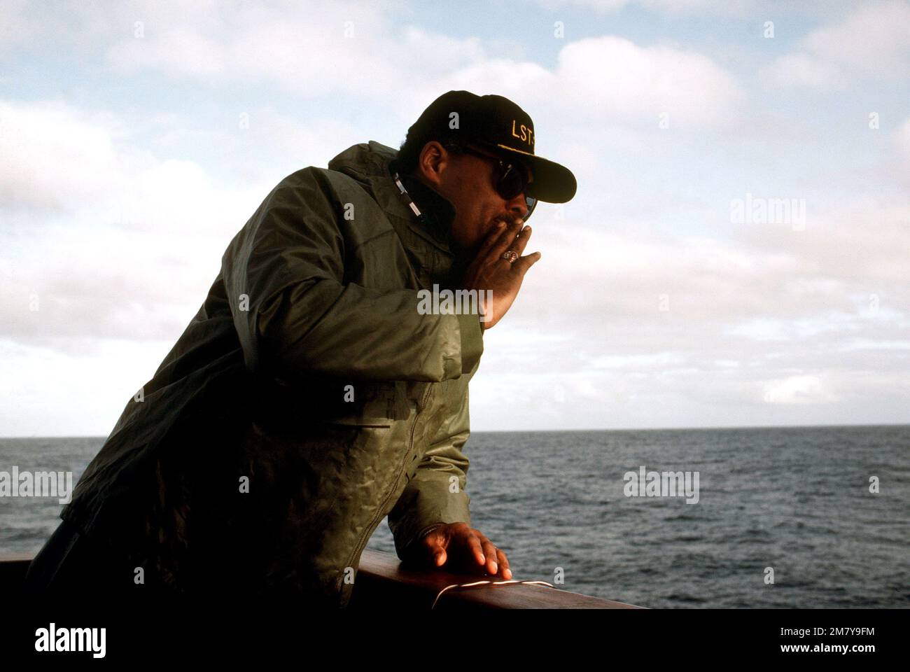 Captain Eguene Bailey, Commanding Officer of the tank landing ship USS ...