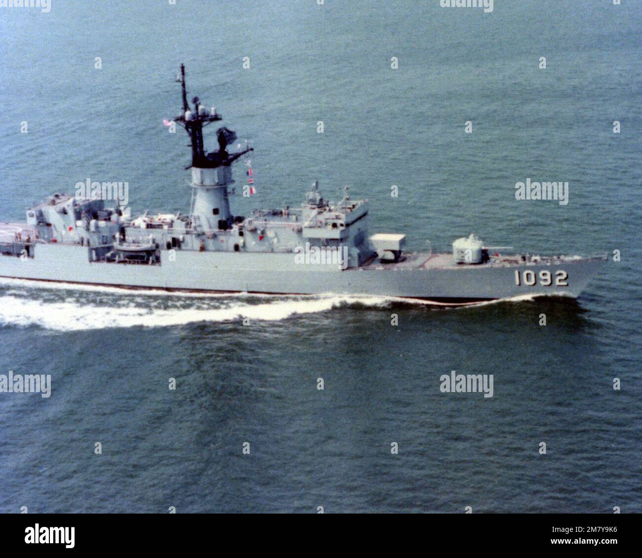 An aerial starboard view of the frigate USS THOMAS C. HART (FF-1092 ...