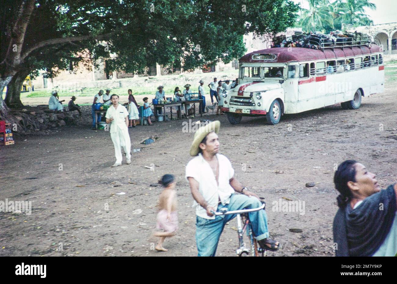 Bus stop with people selling refreshments, Muna, Yucatán Peninsula ...