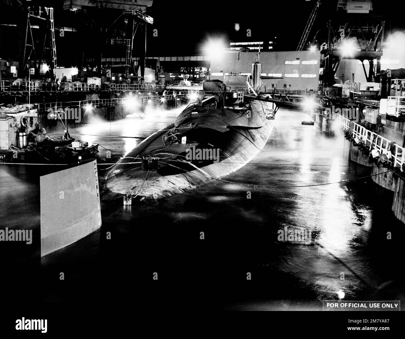 A nighttime starboard quarter view of the nuclear-powered ballistic ...