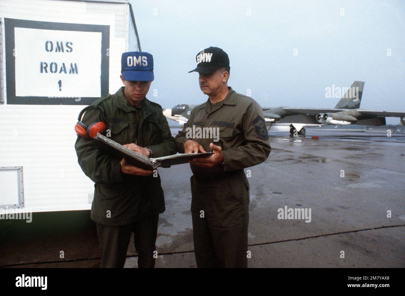 SGT Karl Dittfield, left, a B-52 Stratofortress aircraft crew chief ...