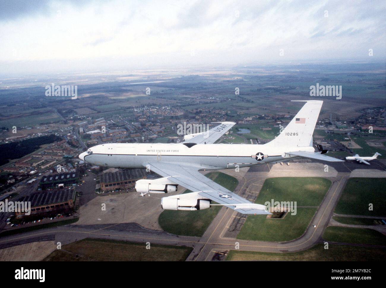 An air-to-air left side view of a EC-135 aircraft flown by the 10th Air ...