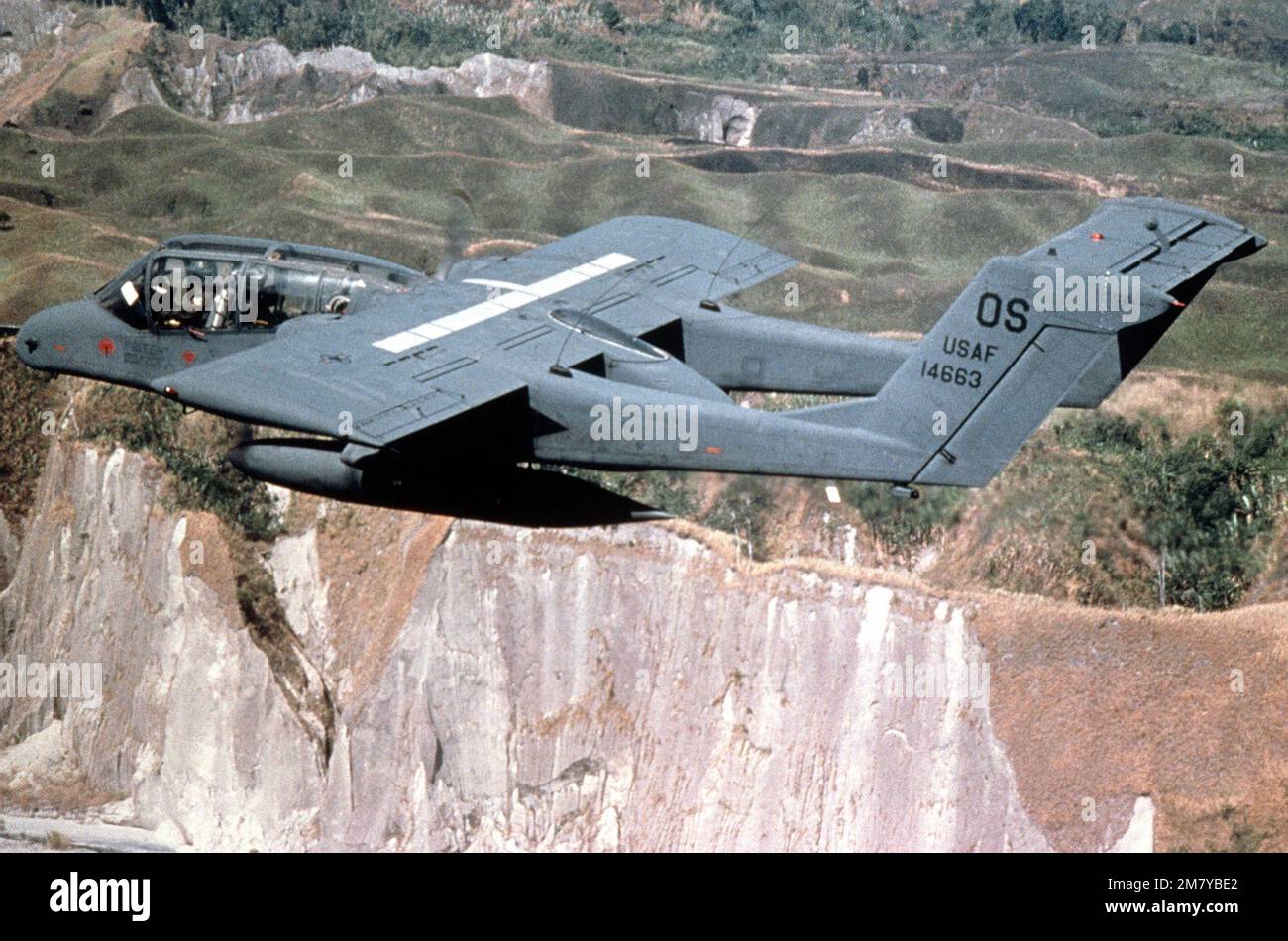 An air-to-air left rear view of an OV-10 Bronco aircraft from the 51st ...