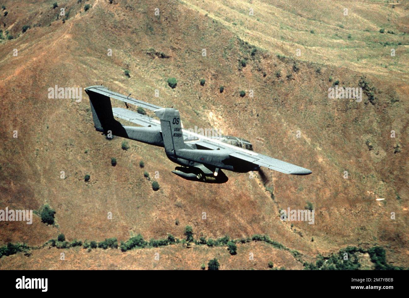 An air-to-air right rear view of an OV-10 Bronco aircraft from the 51st ...