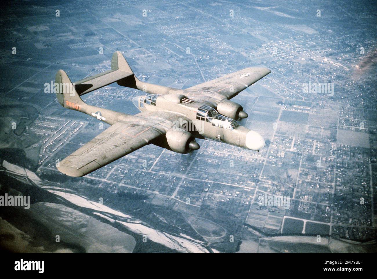 An air-to-air right front view of a P-61 Black Widow aircraft. Country ...