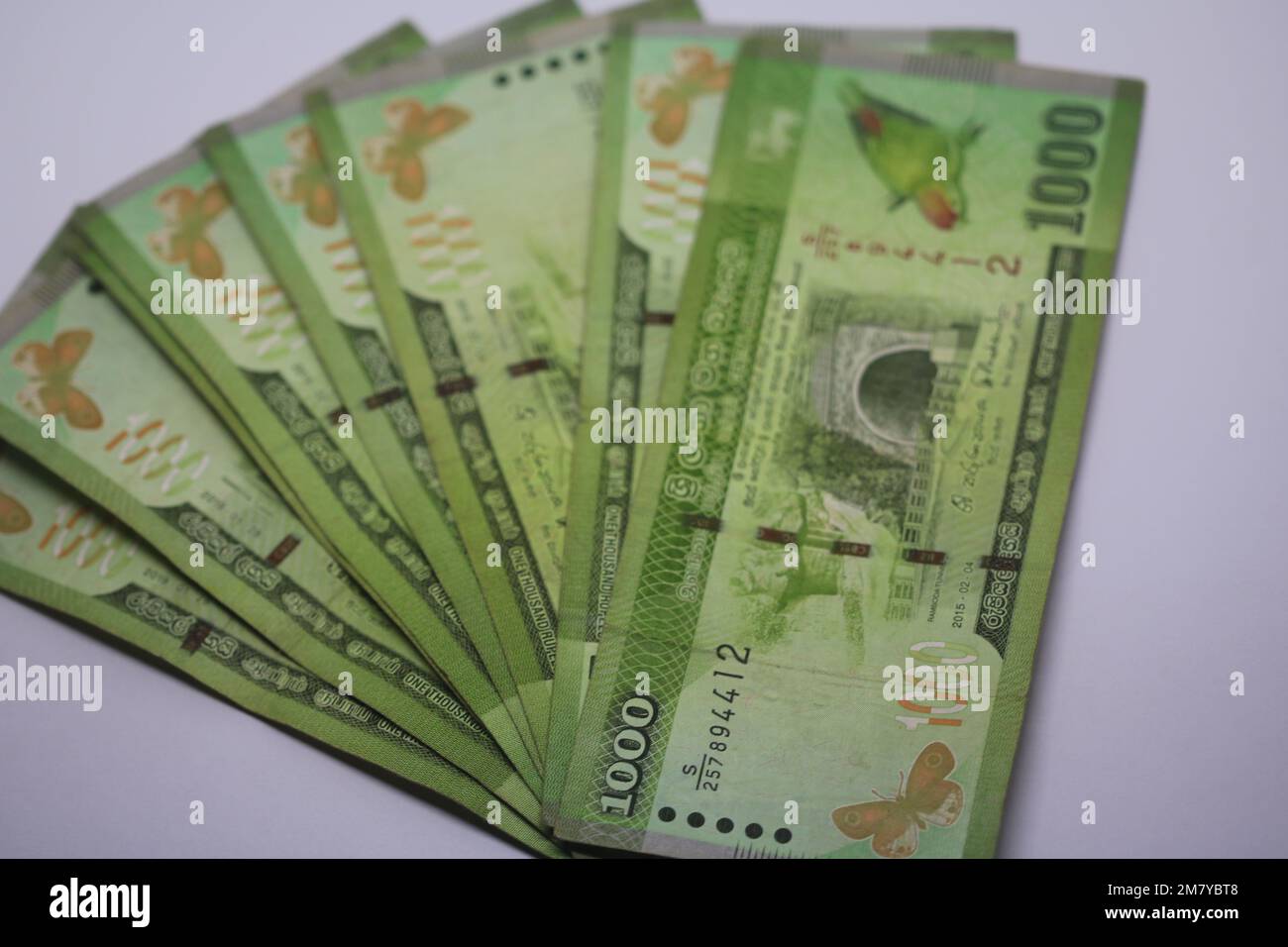A Sri Lankan 1000 rupee bill notes isolated on white background Stock ...