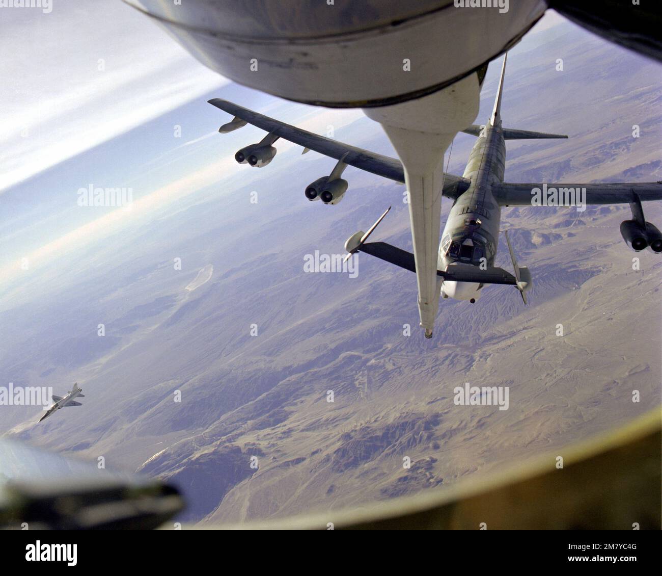 An air-to-air direct front view of a B-52 Stratofortress aircraft as it ...