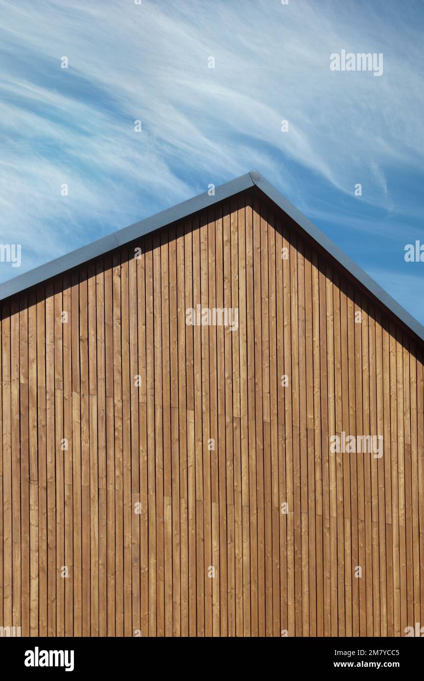 Roof construction with wooden plank gable on a new modern home Stock ...