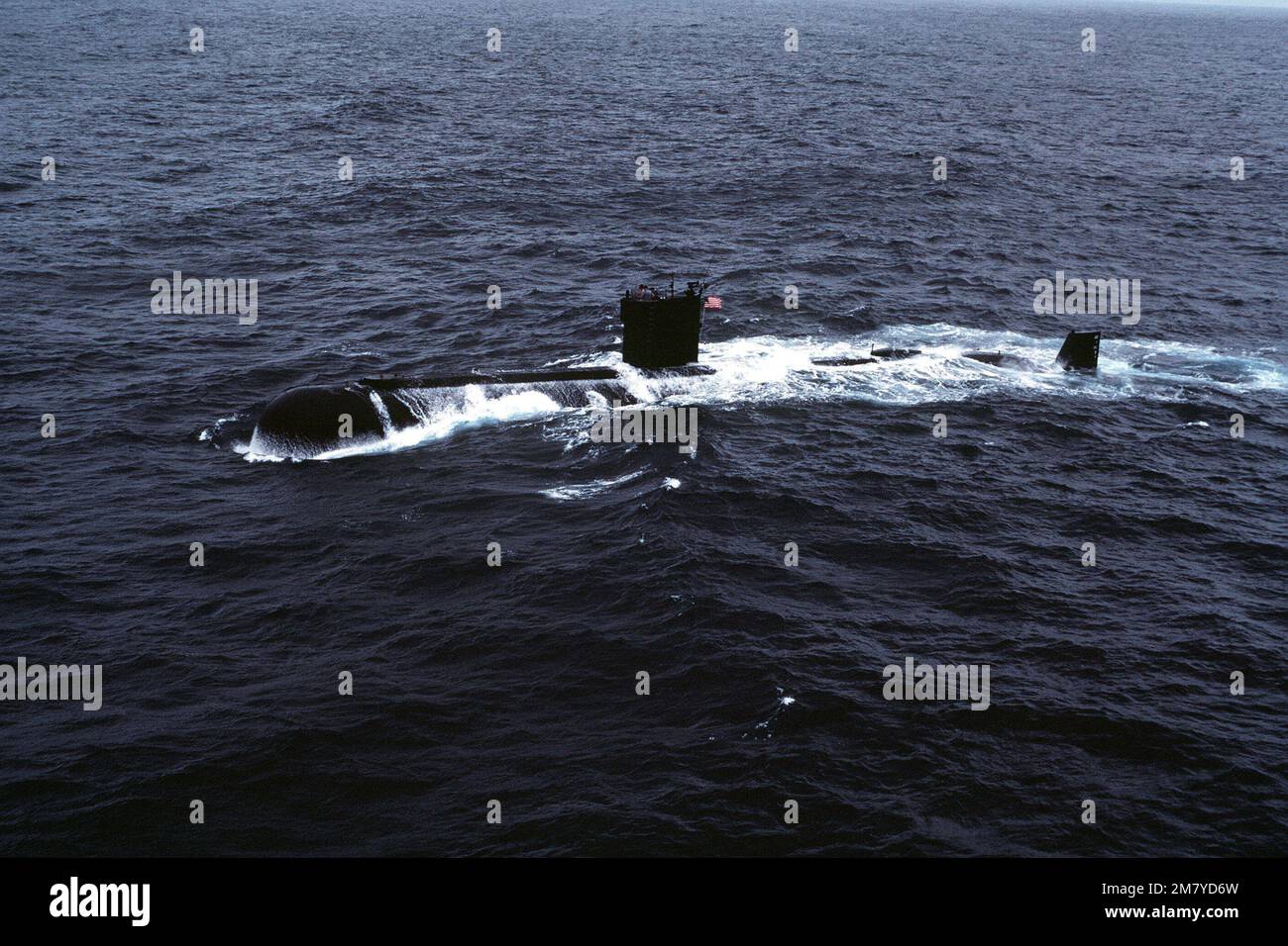 Aerial port bow view of the research submarine USS DOLPHIN (AGSS 555 ...