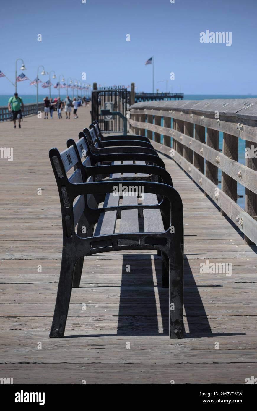 Side view of benches in Ventura Pier, California Stock Photo - Alamy