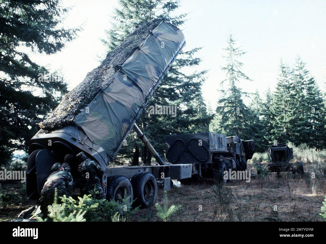 The launcher on a transport-erector-launcher (TEL) vehicle is raised ...