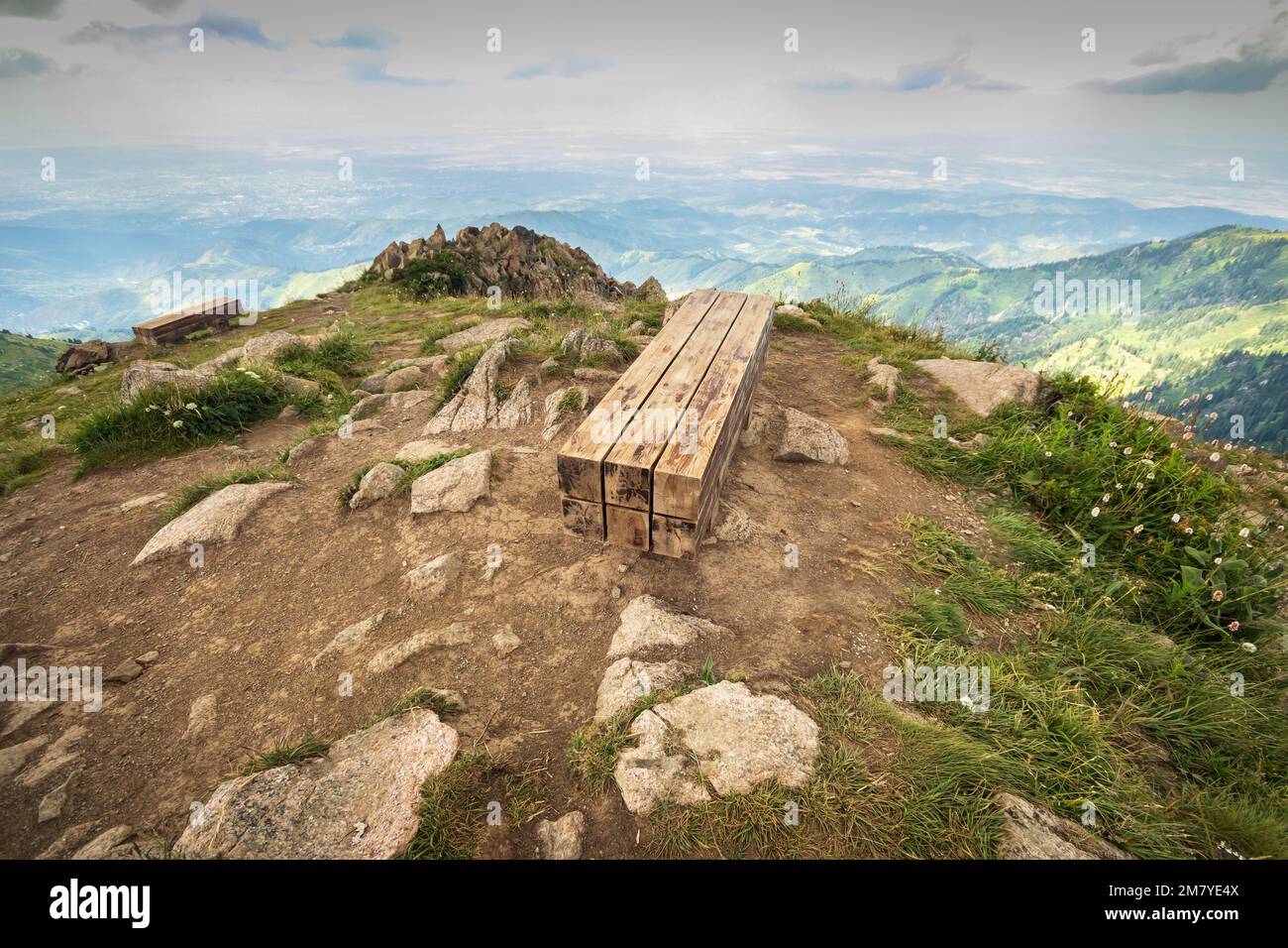 A place with a bench for a halt on Mount Furmanov in the Almaty ...