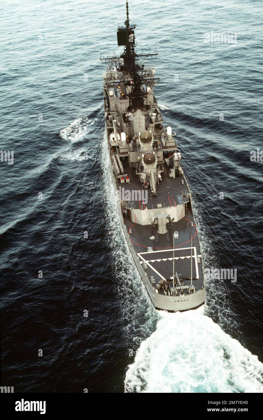 Aerial stern view of the guided missile cruiser USS LEAHY (CG 16 ...
