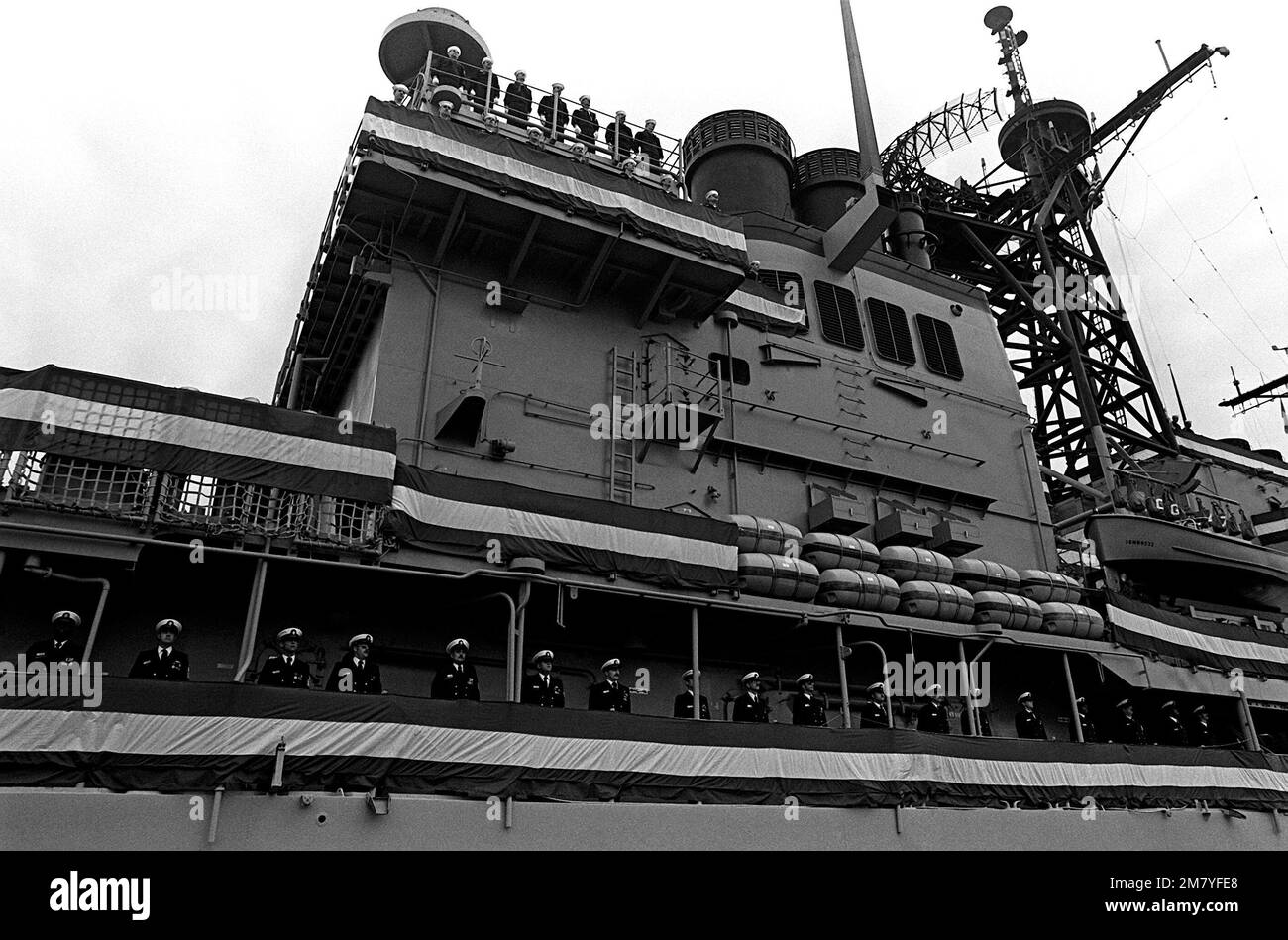Crewmen man the rail aboard the first Aegis guided missile cruiser USS ...