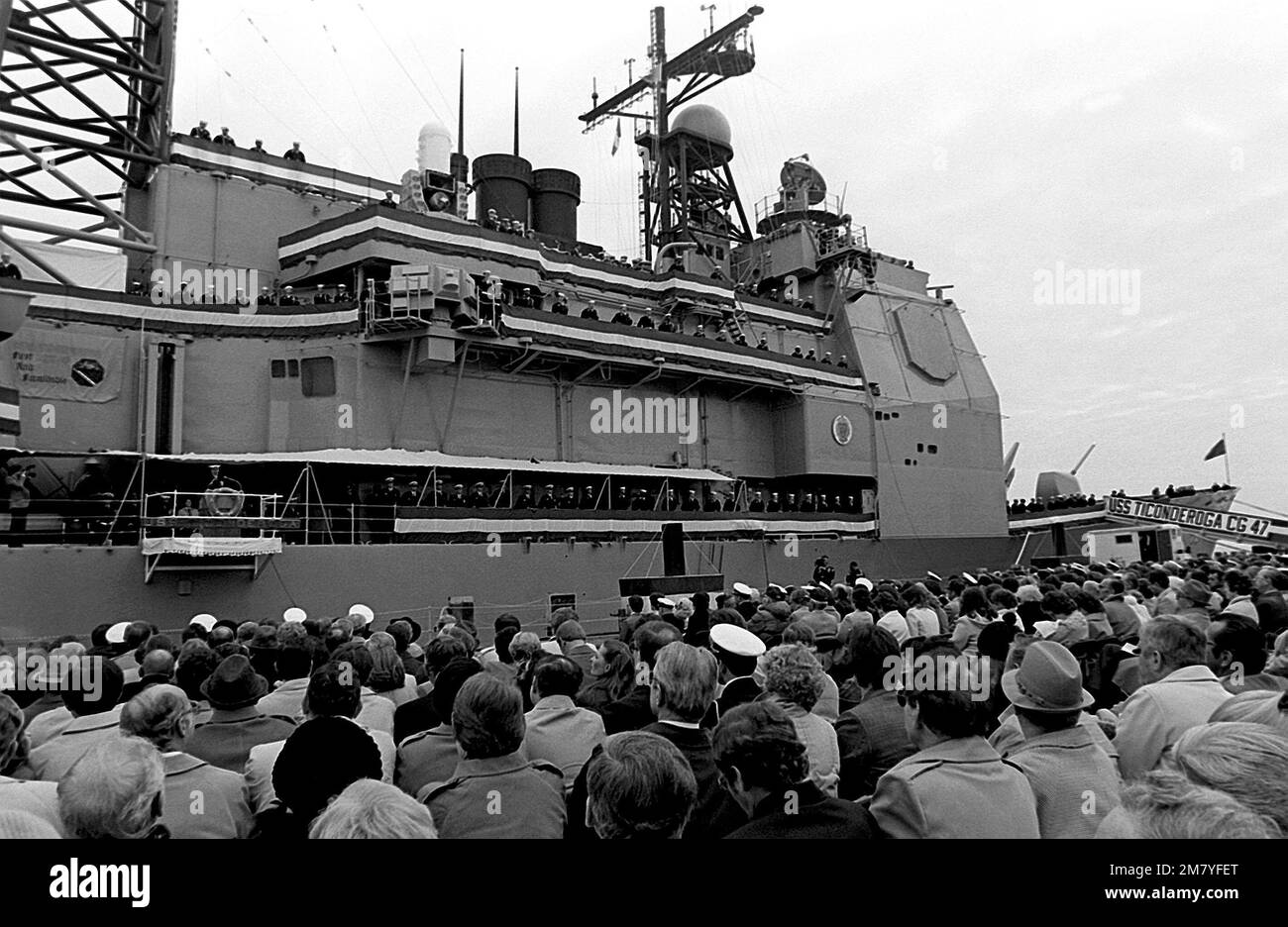 Crewmen man the rail aboard the first Aegis guided missile cruiser USS ...