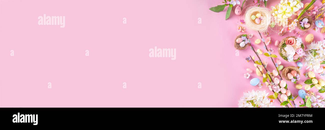 Spring Easter holiday top view flat lay background with eggs in nests ...