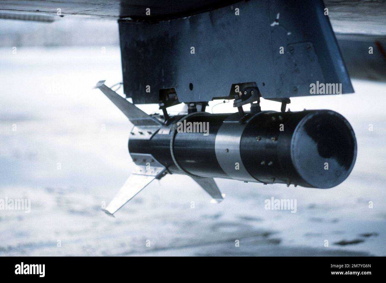 An experimental photo pod installed on the left wing of a T-33 Shooting ...