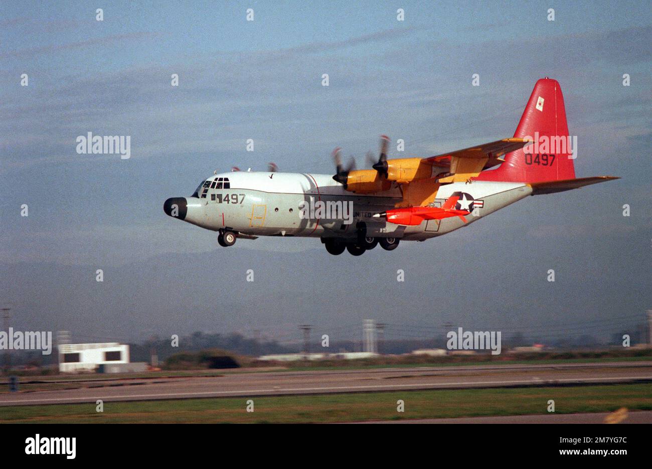 Left side view of a KC-130 Hercules aircraft, with two BQM-34S targets ...