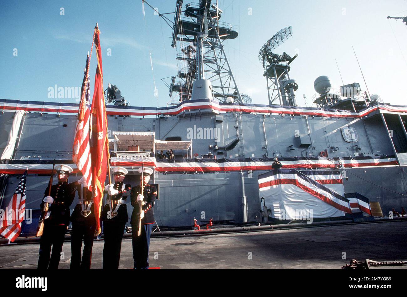 The Marine Corps honor guard present the colors during the ...