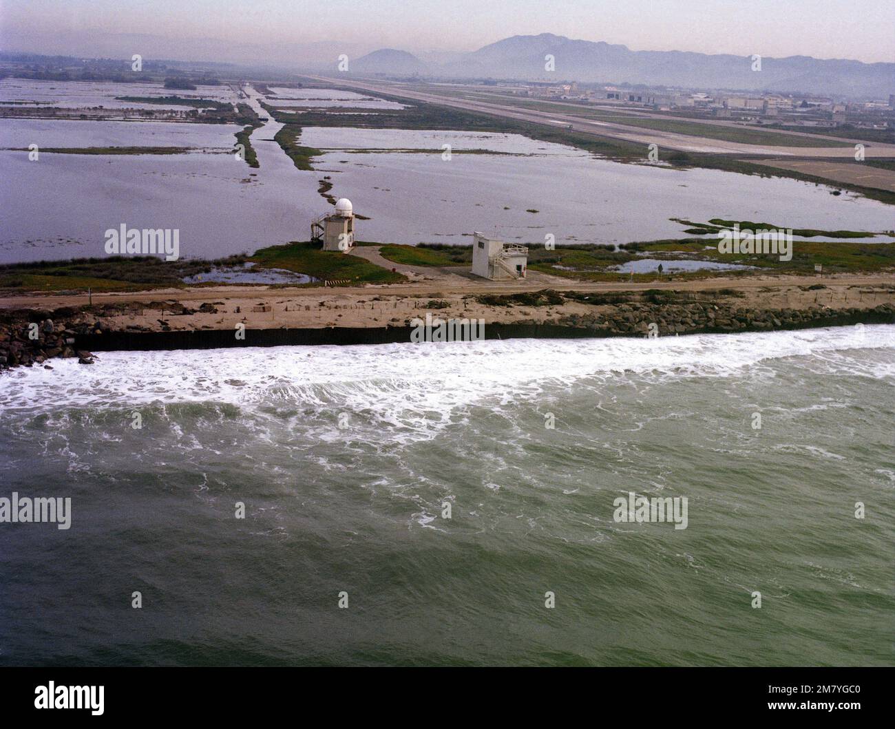 A aerial view of flood damage caused by high tides and heavy rain on ...