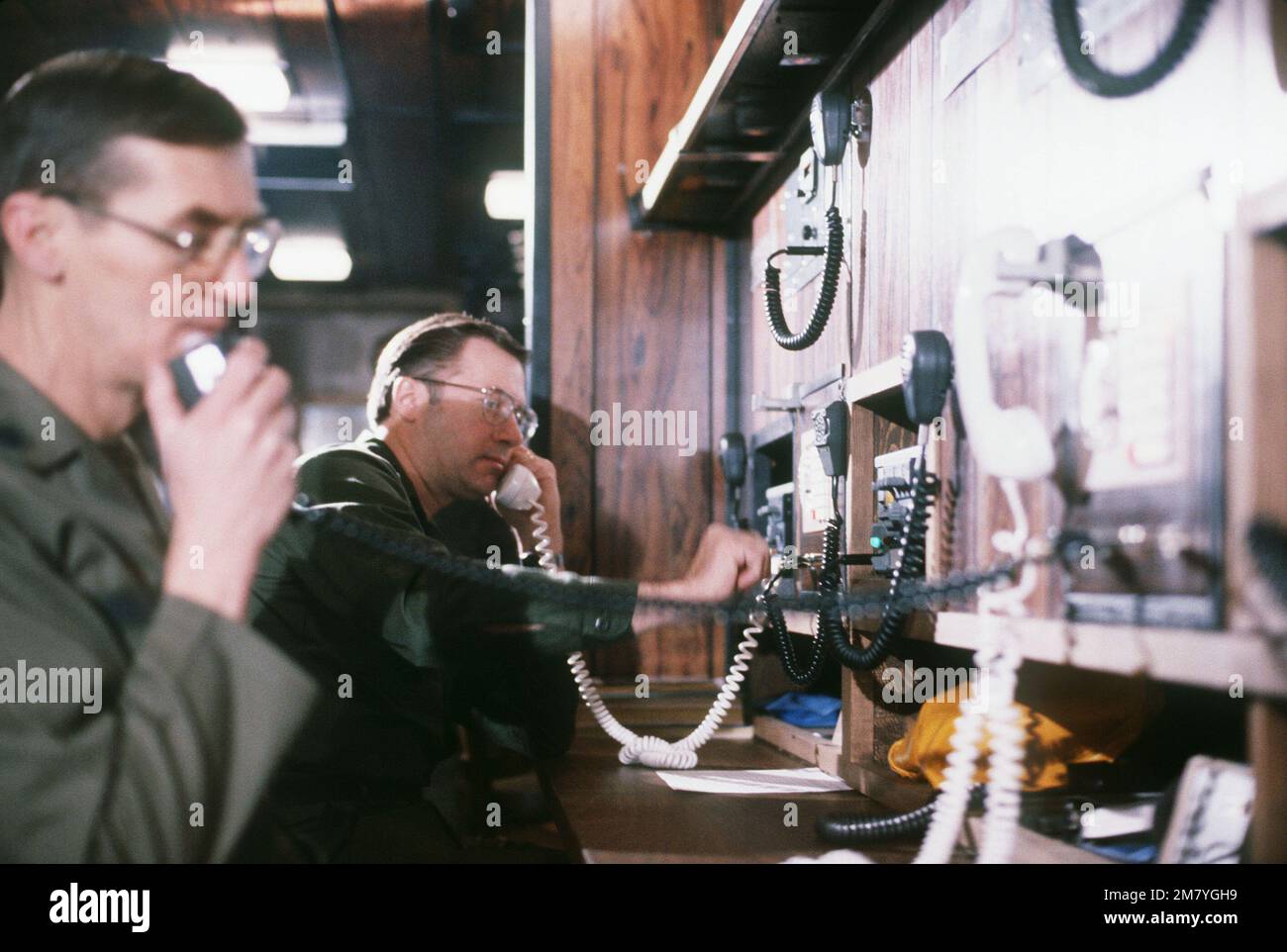 Two members of the Battle STAFF work inside the Control Center of the ...