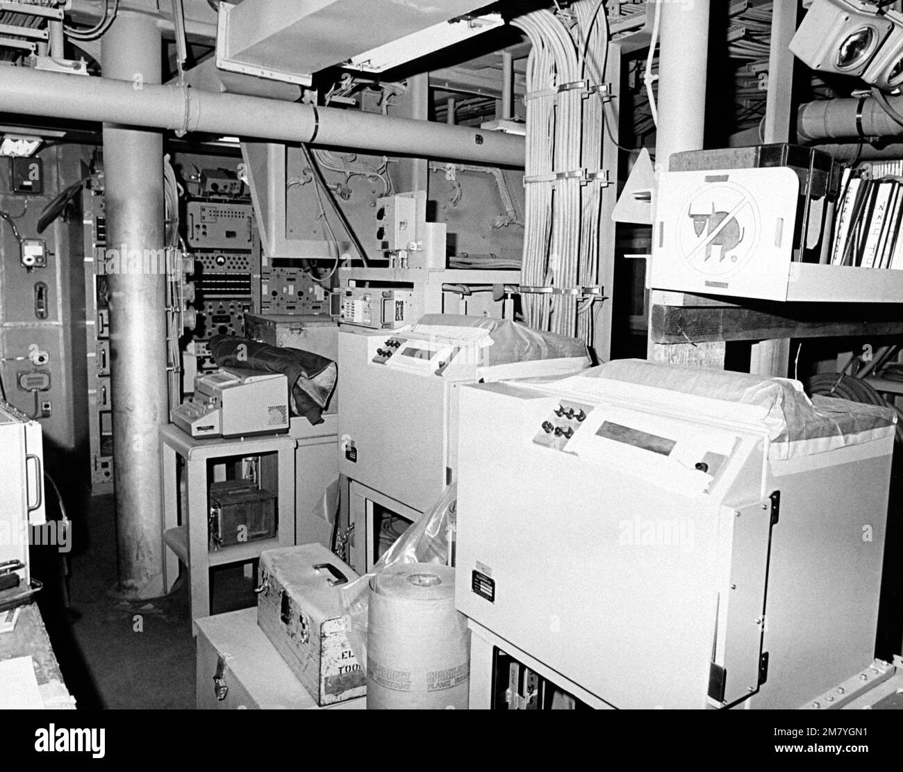 An interior view of the communications center on the guided missile ...