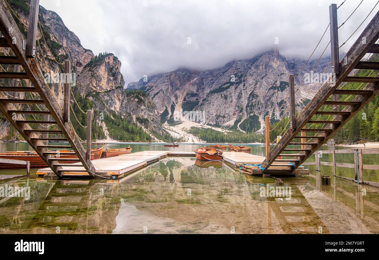 Ladders down to the jetty to hire boats at Lago di Braies in the ...