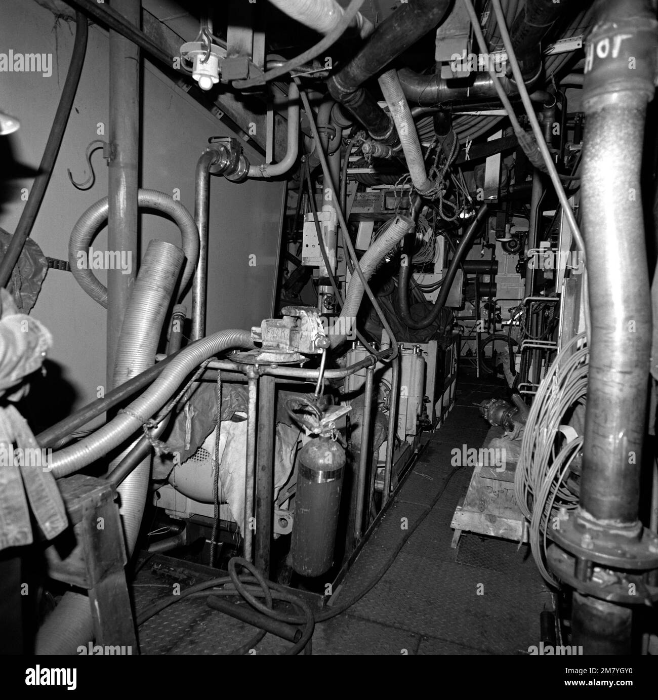 The lower level engine room aboard the guided missile frigate NICHOLAS ...