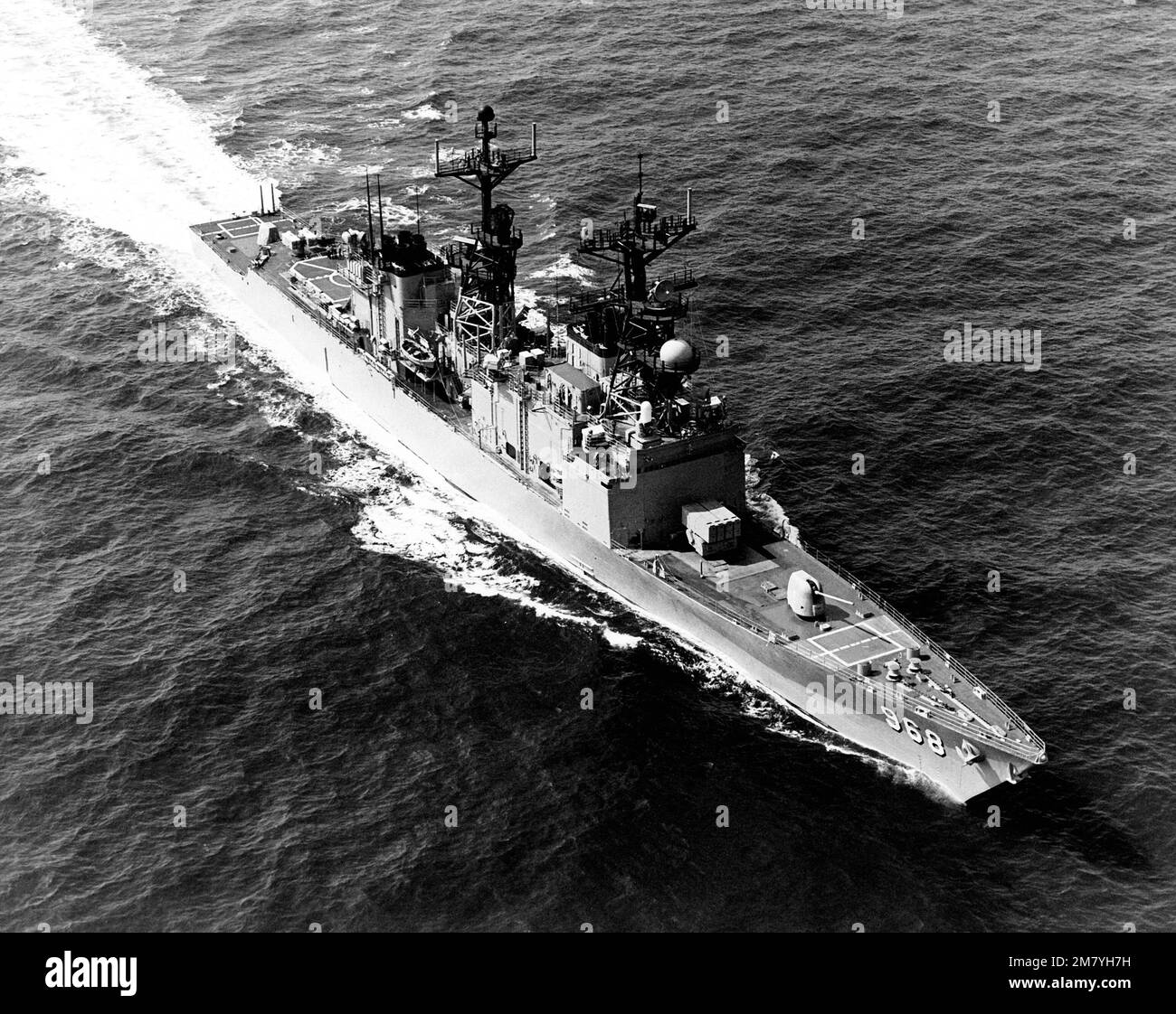Aerial starboard bow view of the destroyer USS ARTHUR W. RADFORD (DD ...