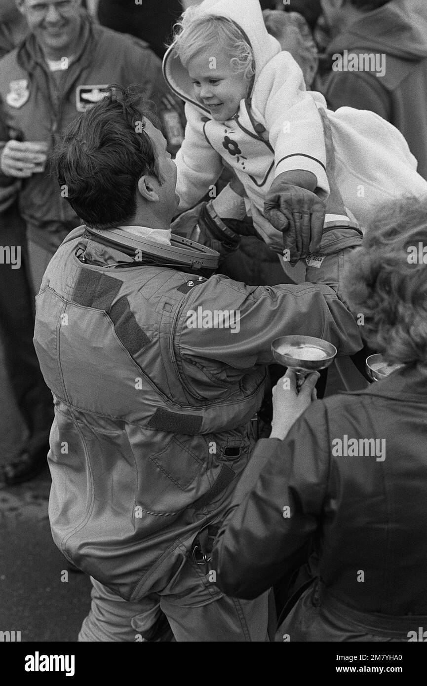 Greeting Captain Mark Spencer upon his arrival after a non-stop flight ...