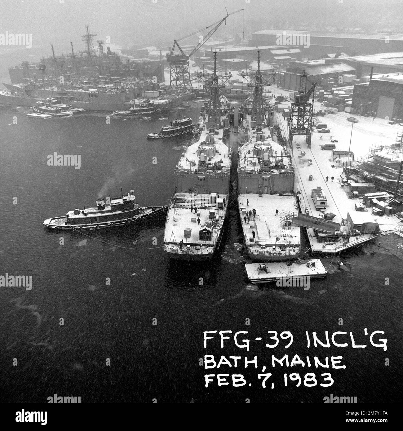 A stern view of the guided missile frigates DOYLE (FFG-39), left, and ...