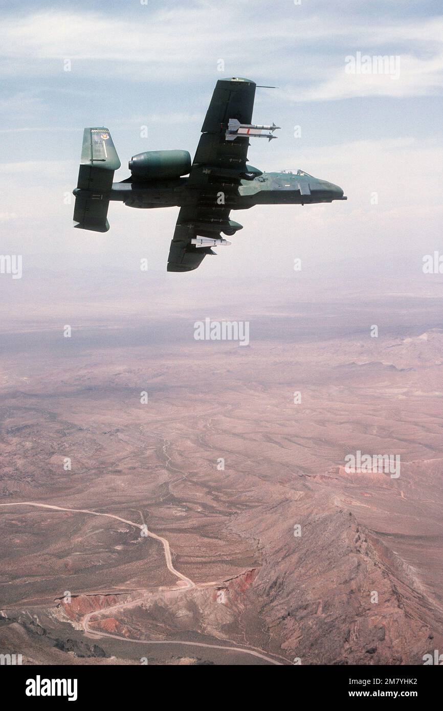An air-to-air right underside view of an A-10 Thunderbolt II aircraft ...