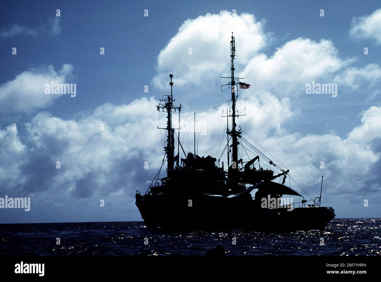 A port quarter view of the salvage ship USS BOLSTER (ARS 38), preparing ...