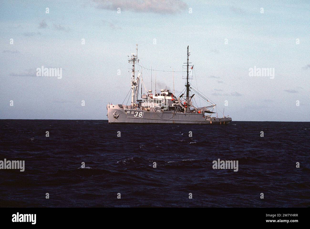 A port bow view of the salvage ship USS BOLSTER (ARS-38) underway ...
