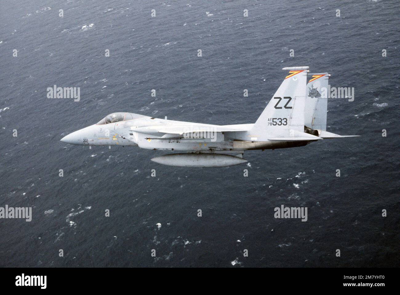 An air-to-air left side view of an F-15 Eagle aircraft assigned to the ...