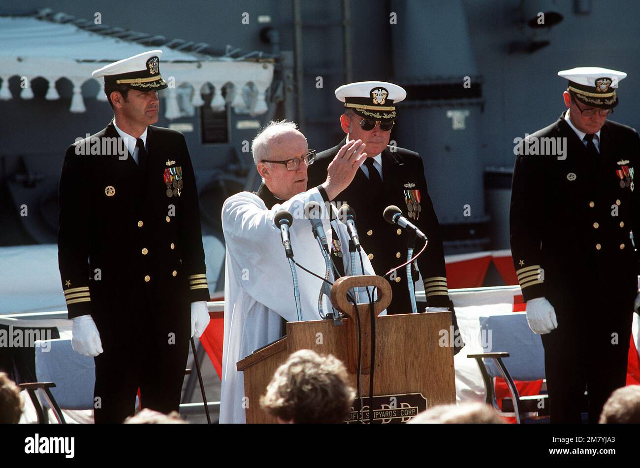 The Rev. John S. Horner leads the guests in prayer commissioning ...