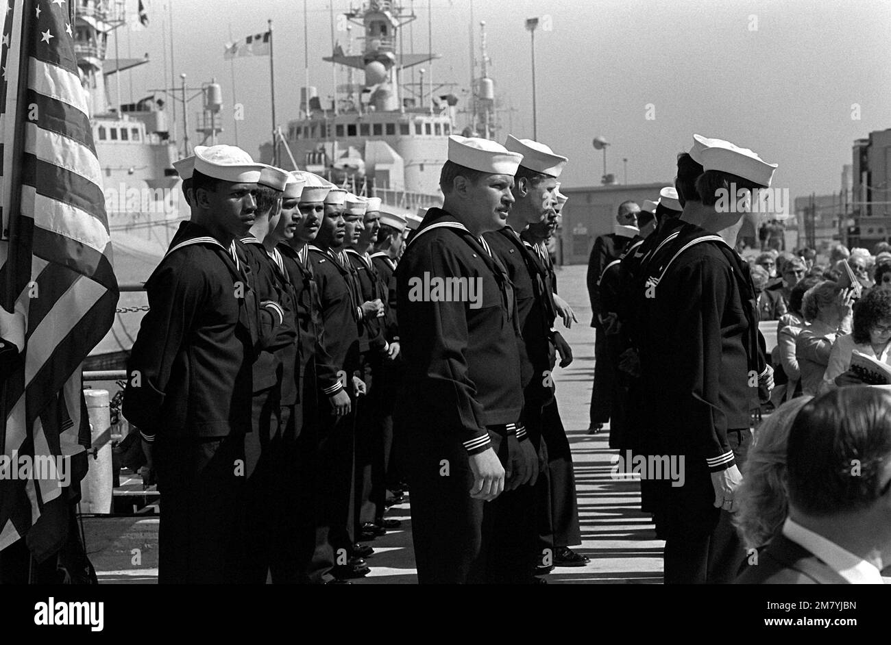 Crewmen stand at parade rest during commissioning ceremonies for the ...