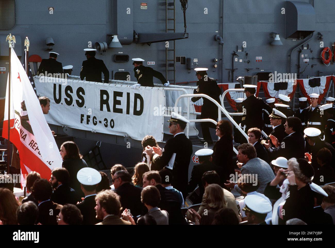 A view of the crewmen going aboard the guided missile frigate USS REID ...