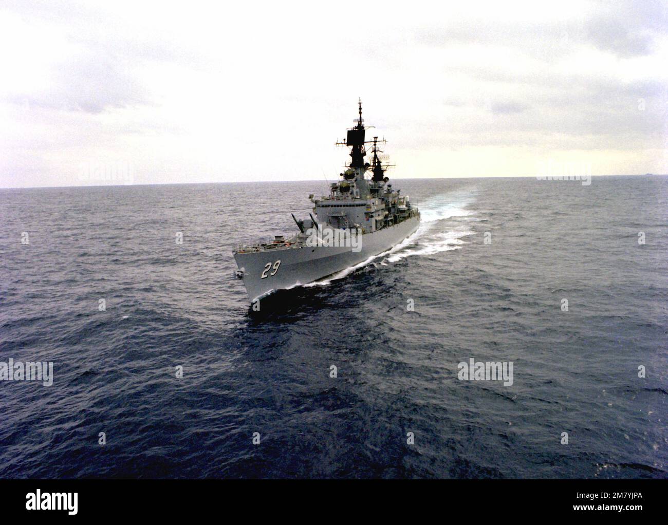 A port bow view of the guided missile cruiser USS JOUETT (CG-29 ...