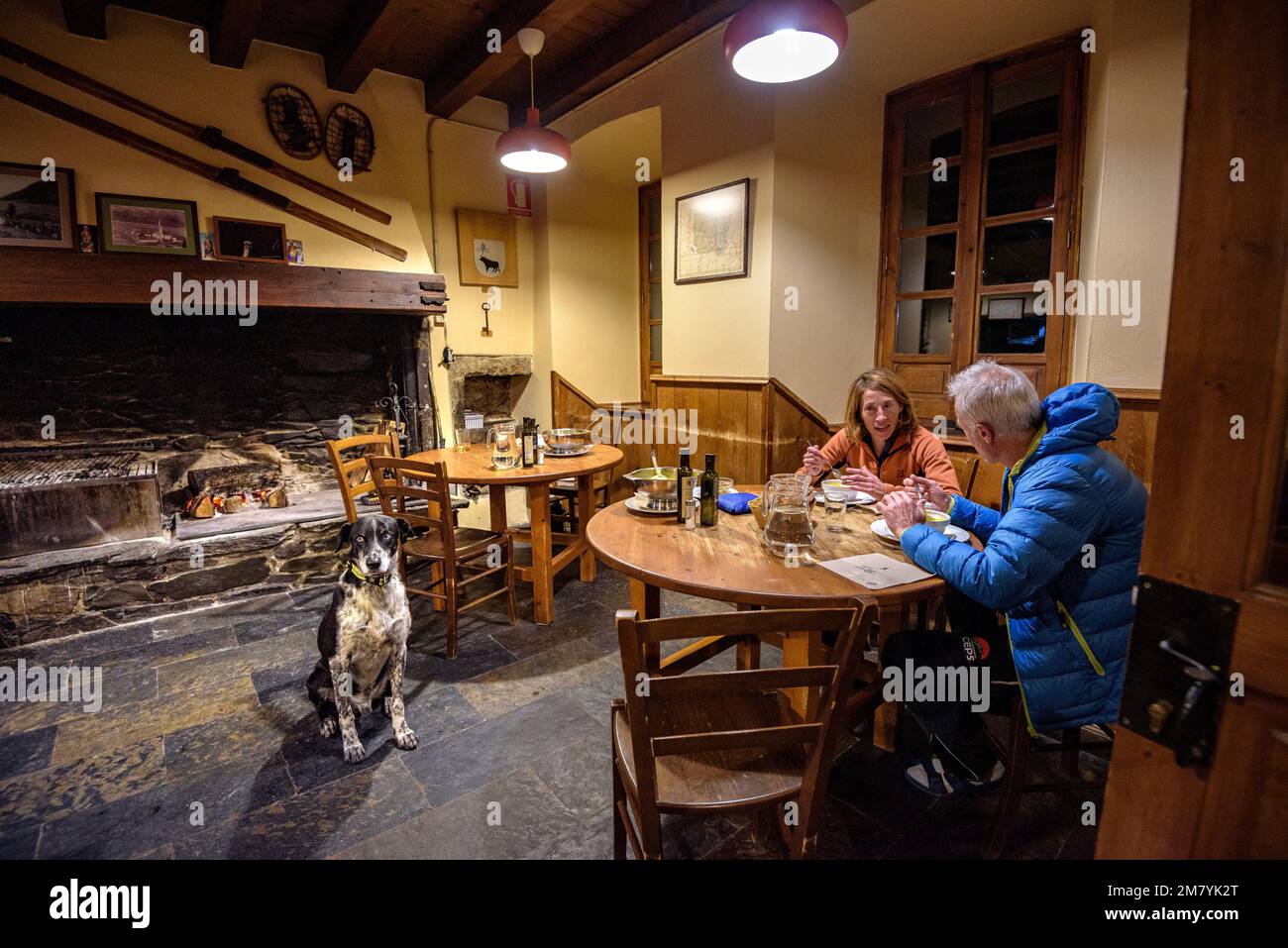 Interior of the Montgarri refuge, on a winter night (Valle de Aran ...