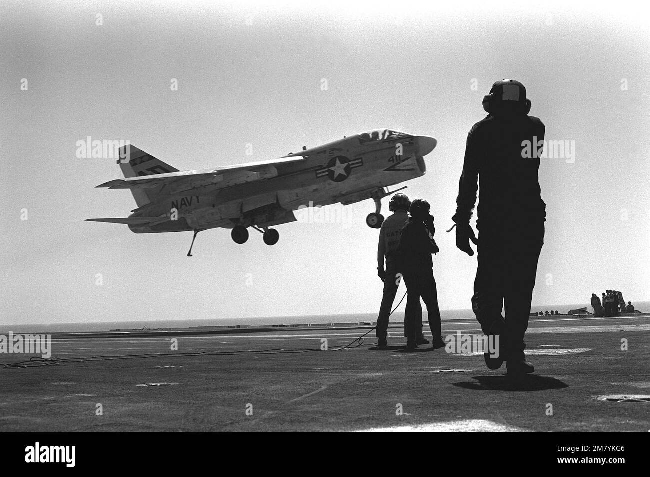 An A-7 Corsair II aircraft prepares to land aboard the aircraft carrier ...