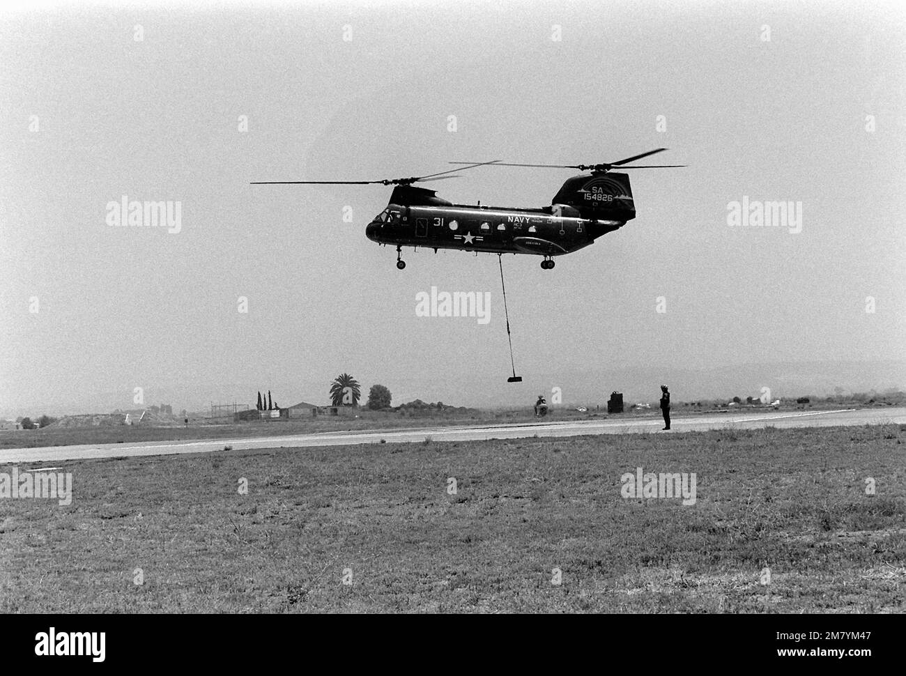 Left side view of a UH-46 Sea Knight helicopter from Helicopter Combat ...