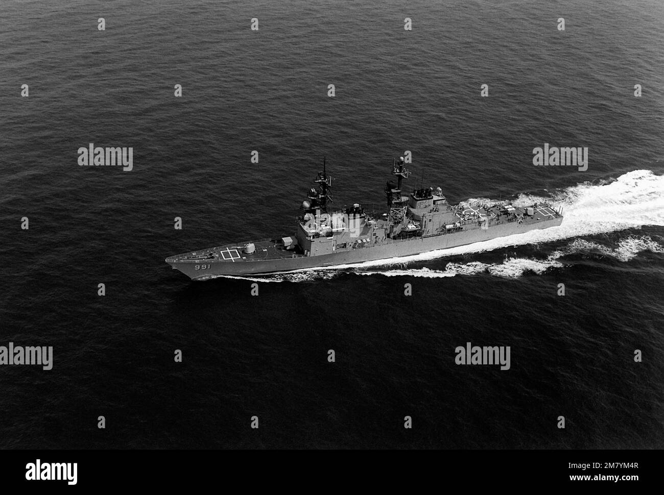 An aerial port beam view of the destroyer USS FIFE (DDG-991) underway ...