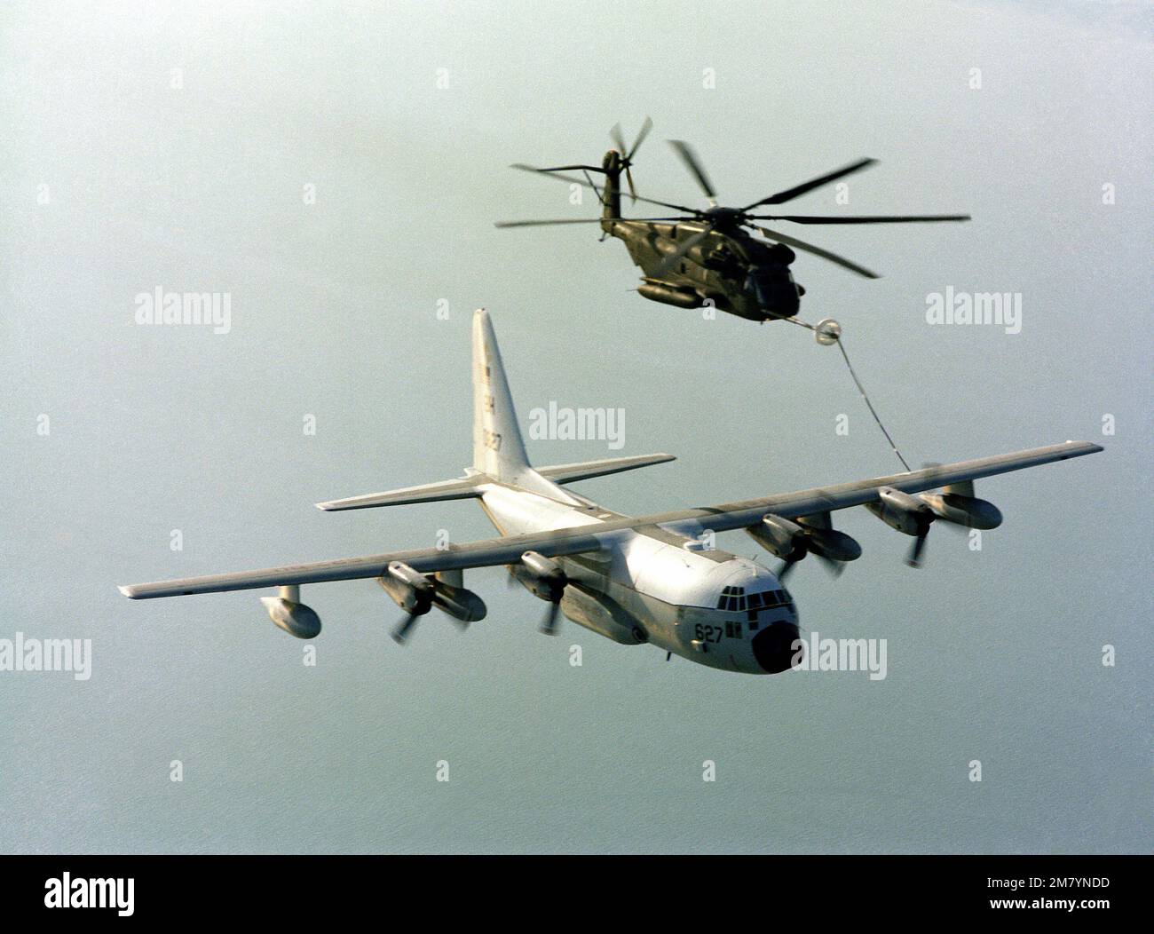 A left front view of a Marine Corps CH-53E Super Stallion helicopter ...