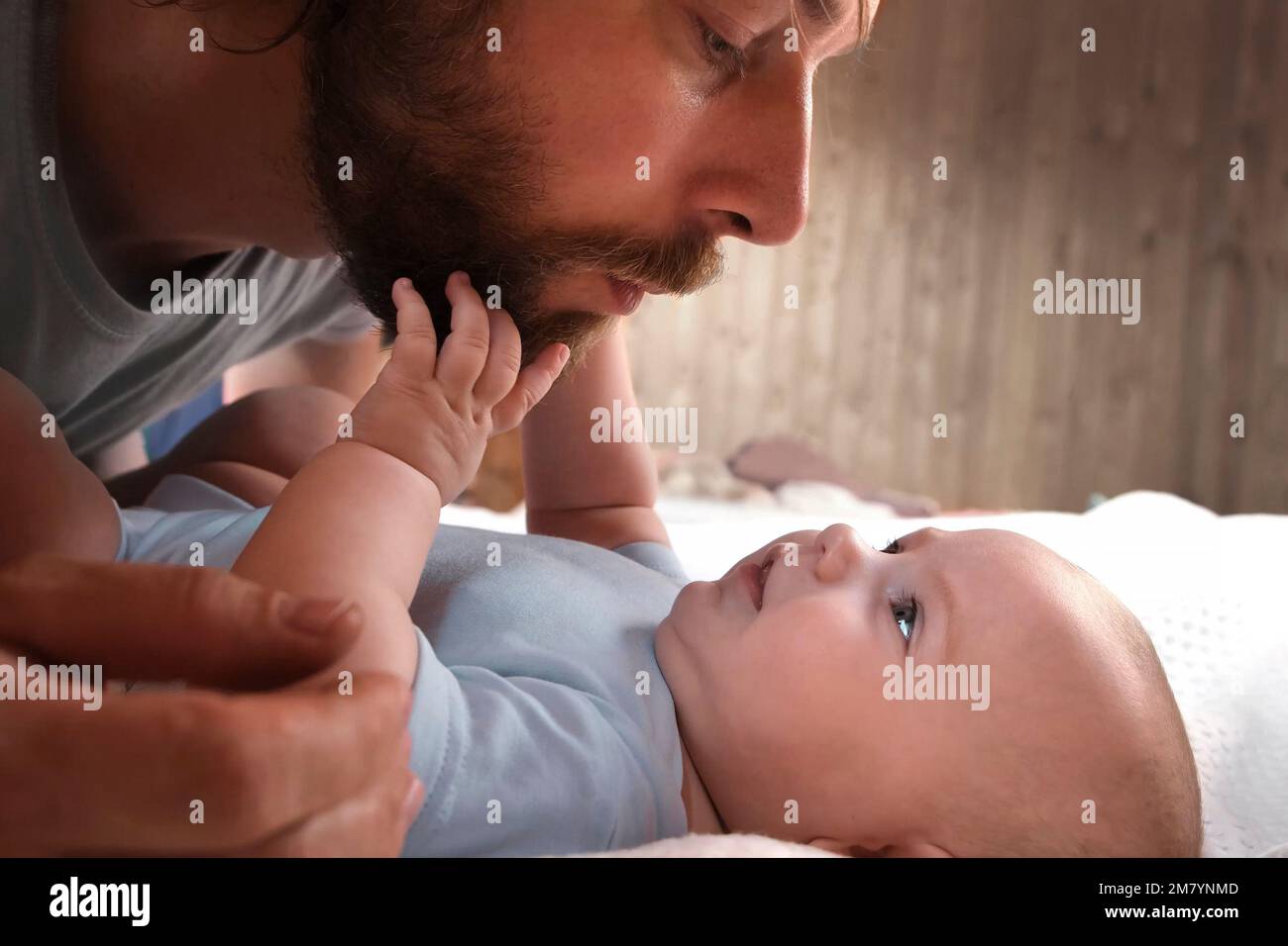 Father with his Daughter, tiny infant. Newborn baby smiling, laughing ...