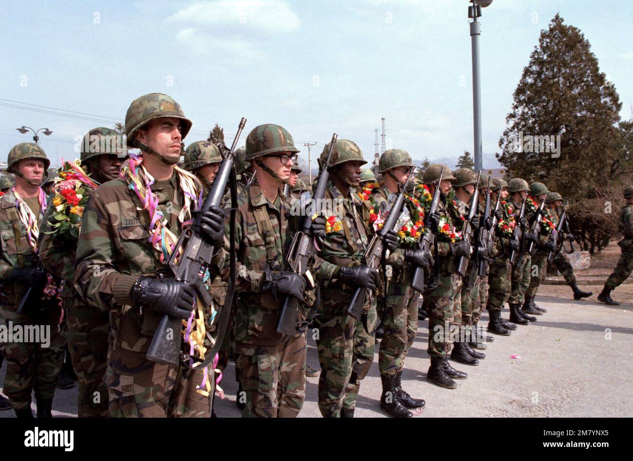 The 25th Infantry Division (Tropic Lighting) stands in formation after ...